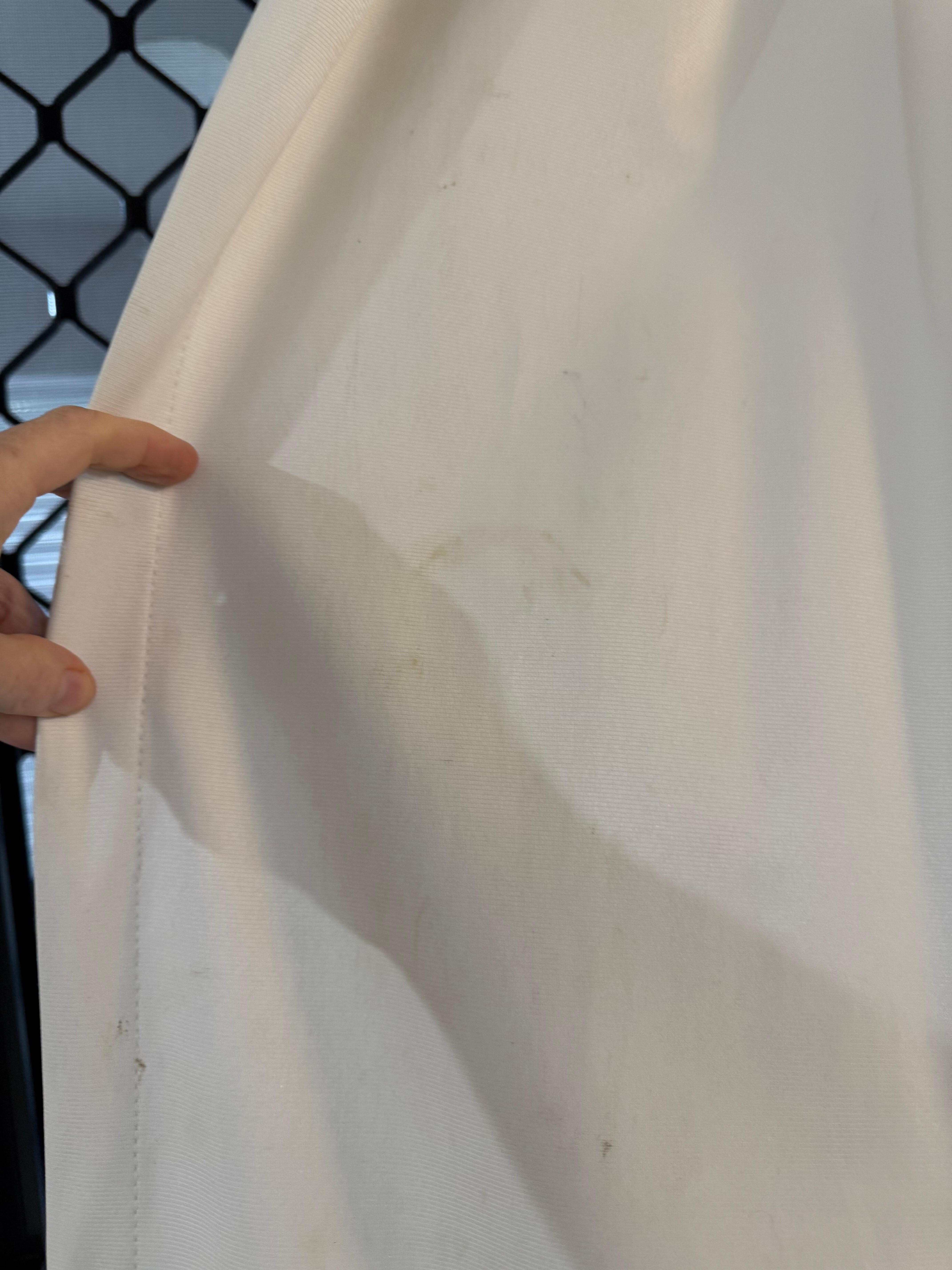 One of many stains on the curtain - Right side - Sitting area. Sheer curtains are the same. 