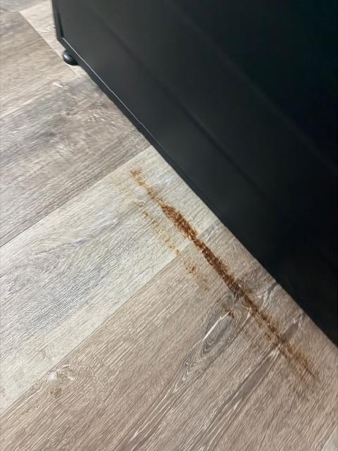 stain at the base of the bed. 