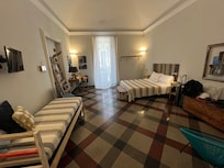 Whole room, very large. Wall mounted AC with remote not shown, but very good at keeping room cold.