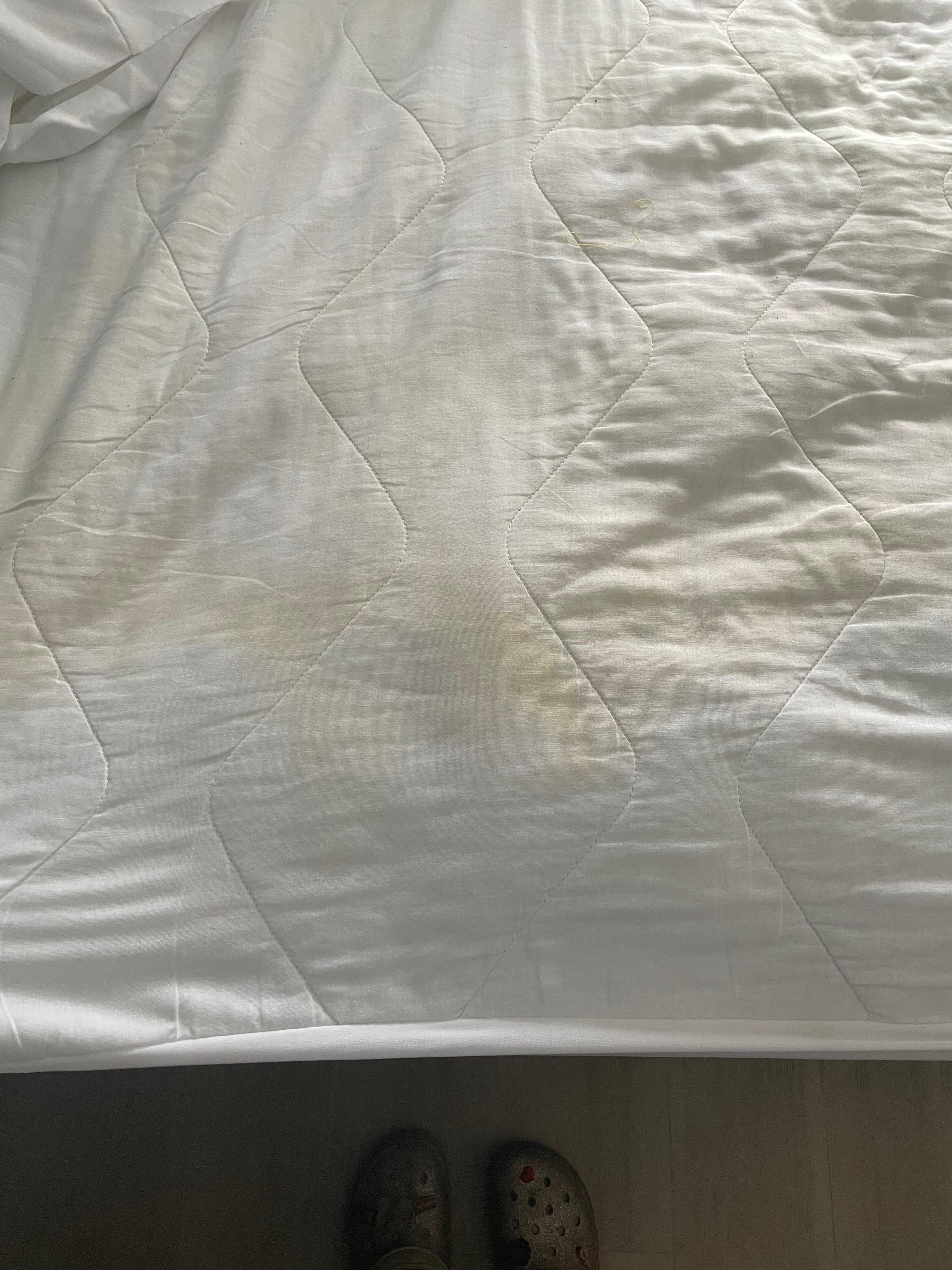 Dirty sheets and mattress cover