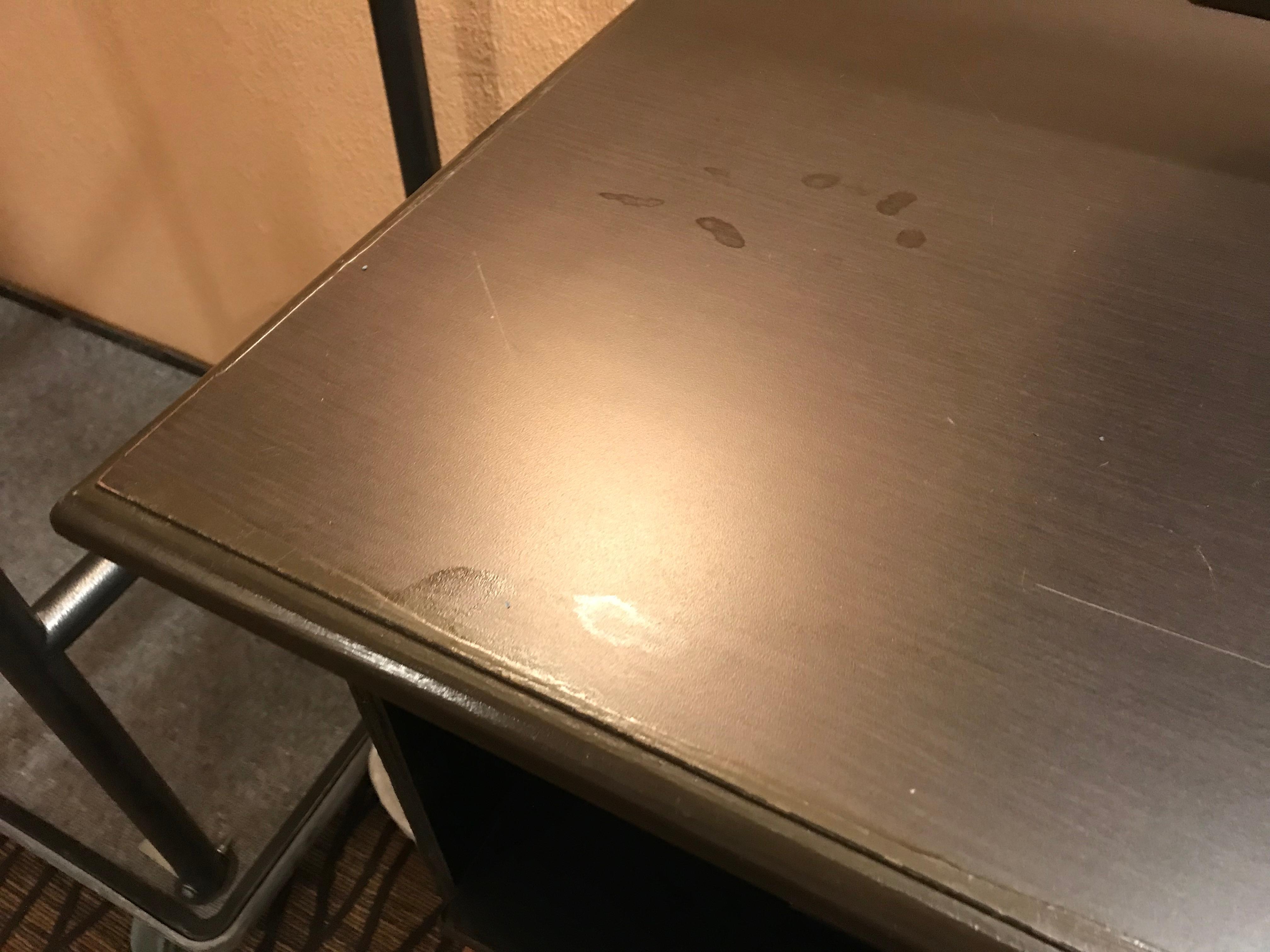 Sticky finger prints on the TV cabinet.