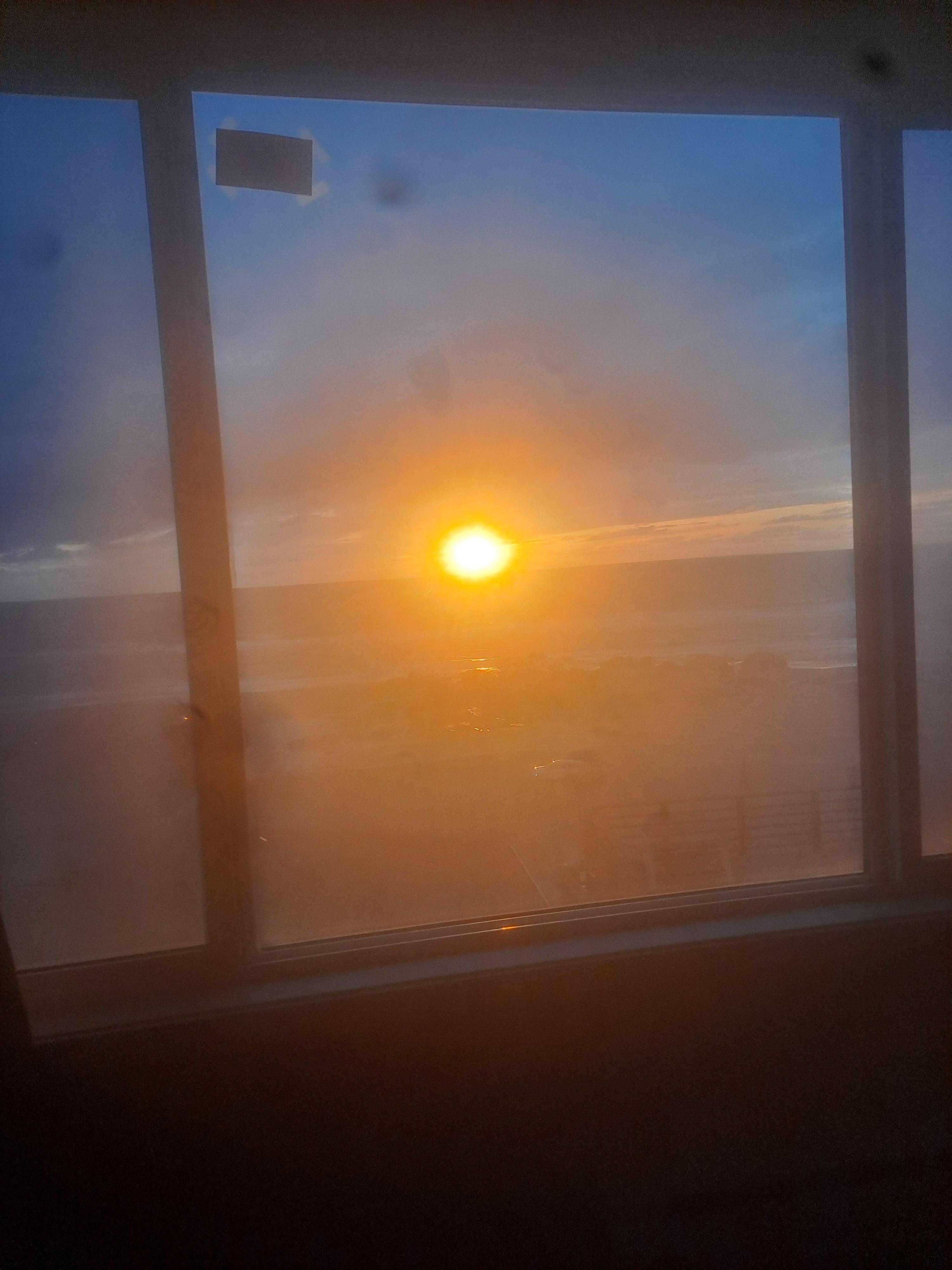 Nice clean windows as the sun goes down was very beautiful .