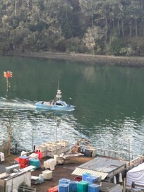 Fishing boat leaving harbor