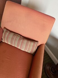 Nasty spots and trash in the chair and couch