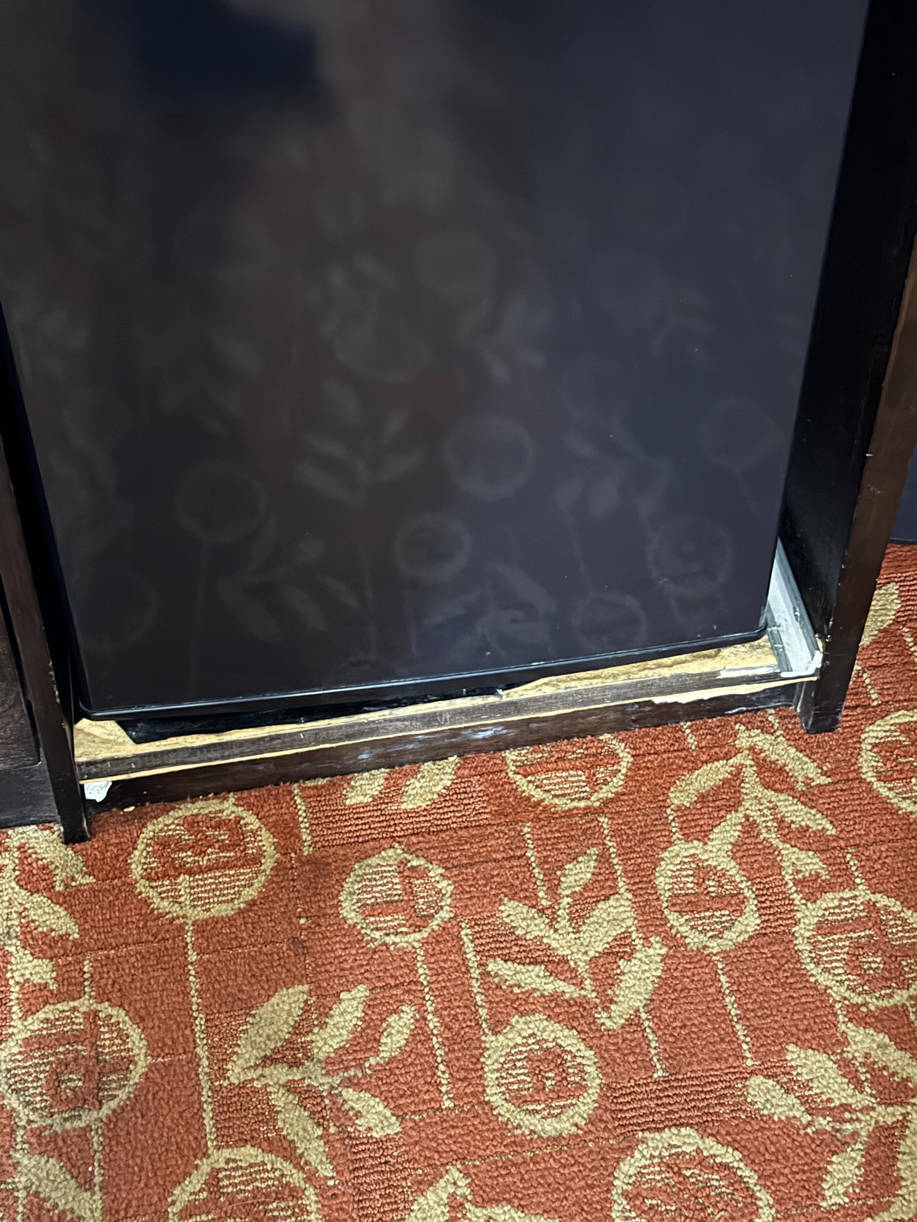 Dressed was damaged and broken under fridge 