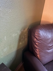 Broken chair and wall