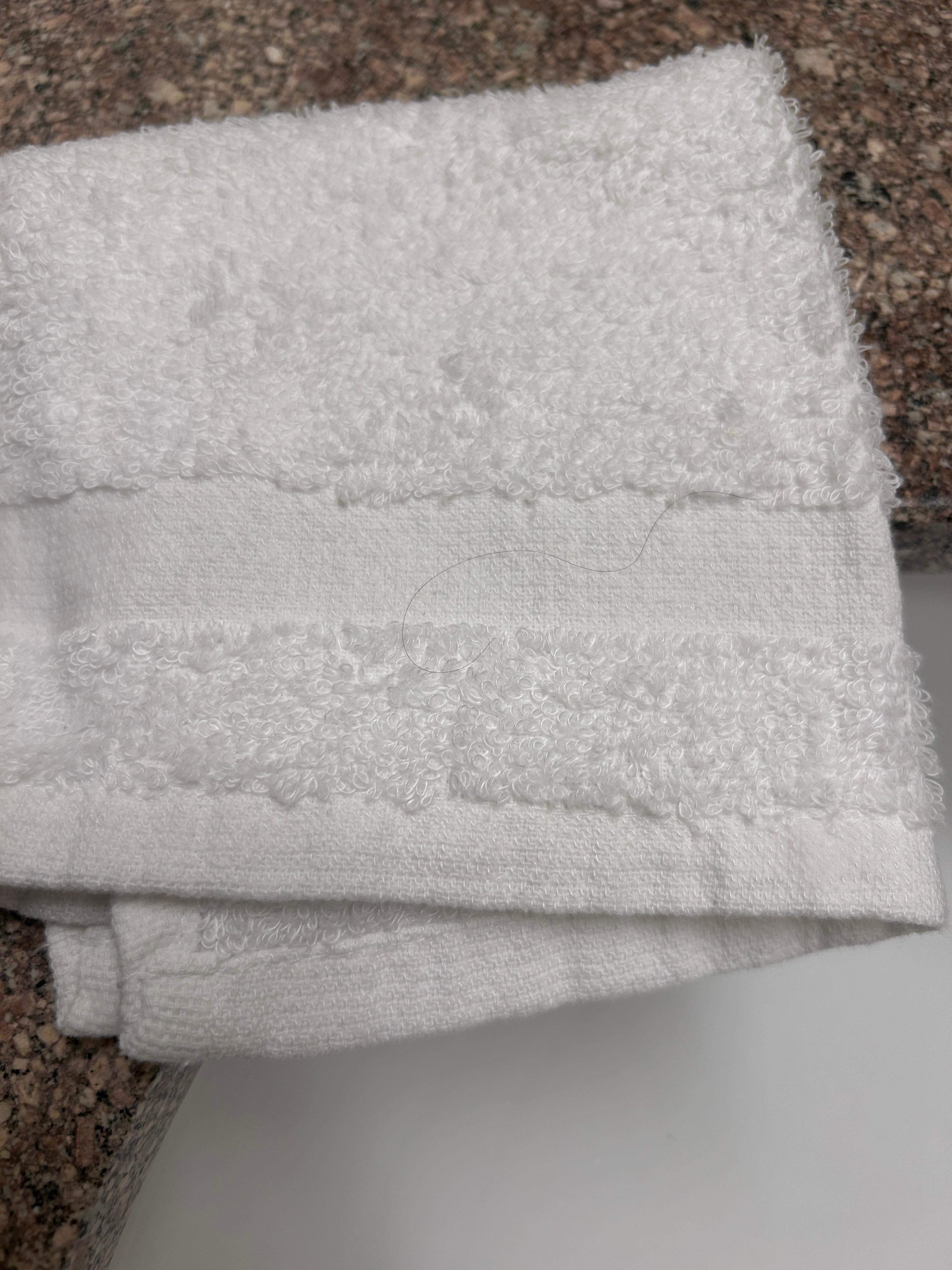 Hair on an unused towel. 