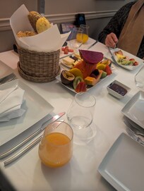Breakfast was great! Lots of fresh fruits, juices, breads, cheeses and meats. Hot chocolate, coffee, eggs to order, and the best chocolate croissant I have ever eaten!