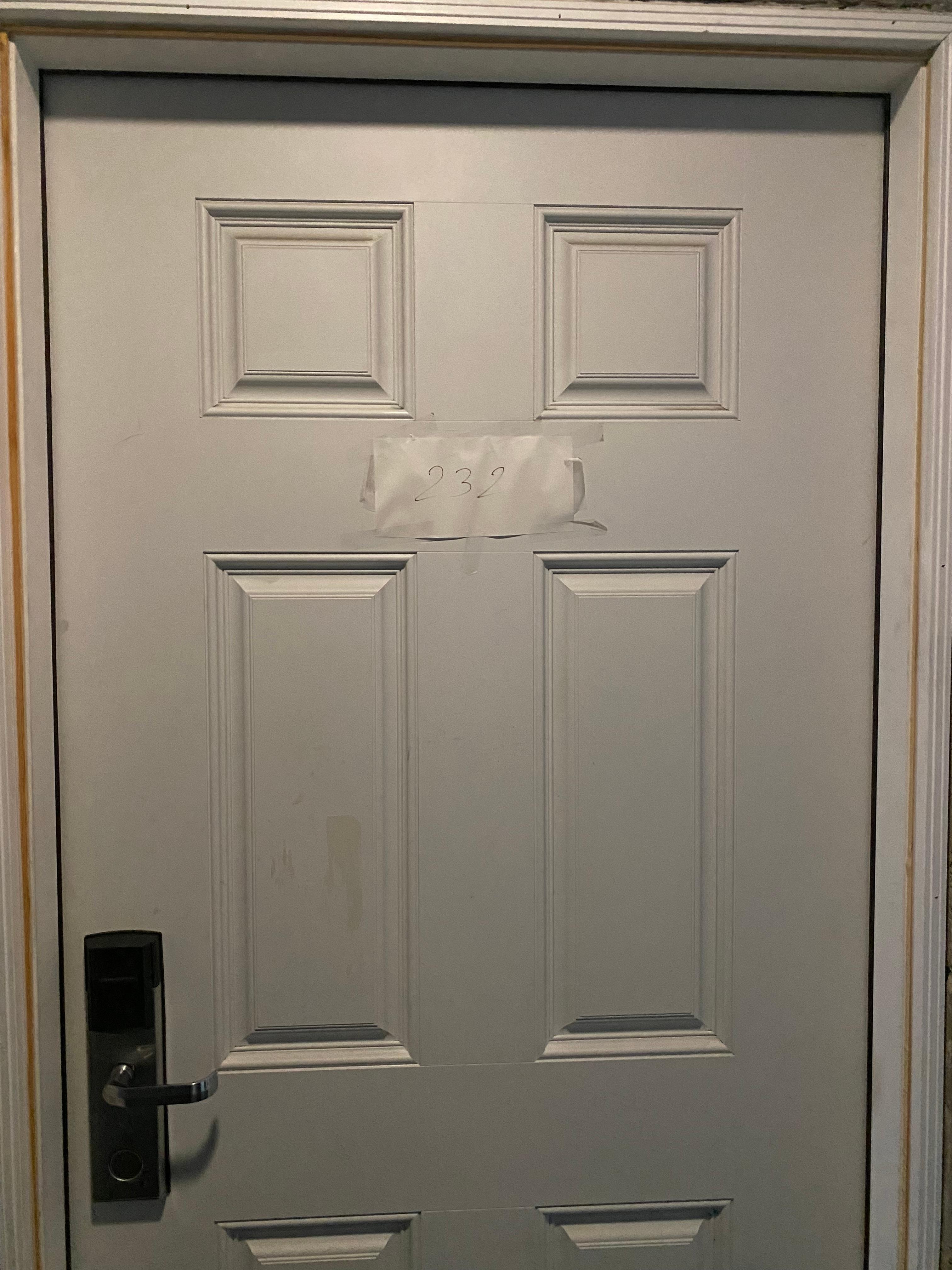 The written number on the door showed the level of disarray of this property