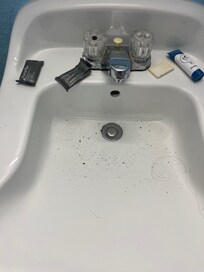 dirty sink the stopper was too hard to pull up plus the sink was leaking