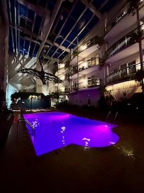 Pool area feels tropical and has nice lighting at night