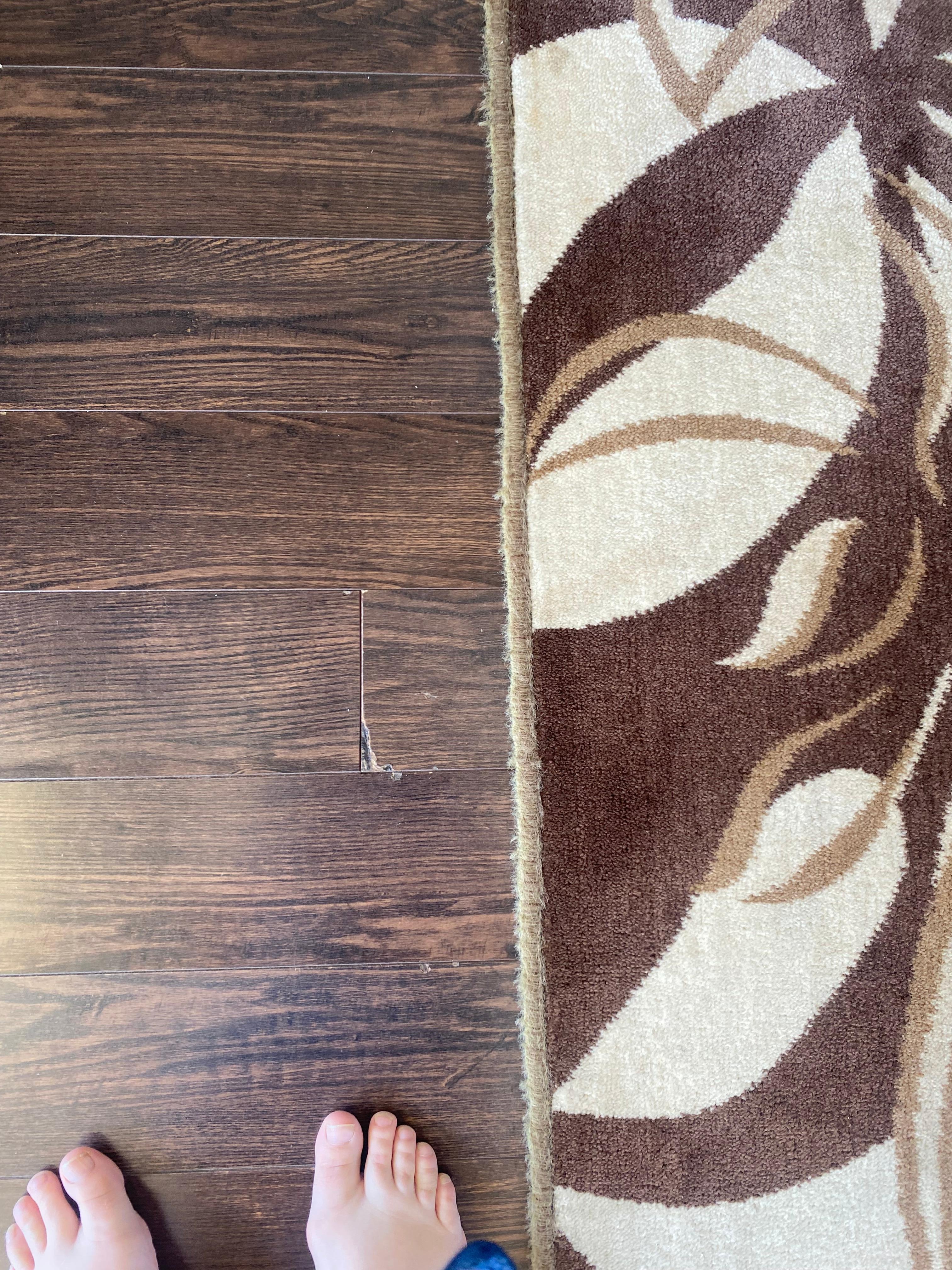 broken floor tiles around the room / general maintenance issues