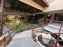 Looking at pool from bar