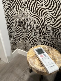 Hole in the wall with exposed wires