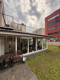 Small deck area outside of gym. Beautiful day in Taipei!