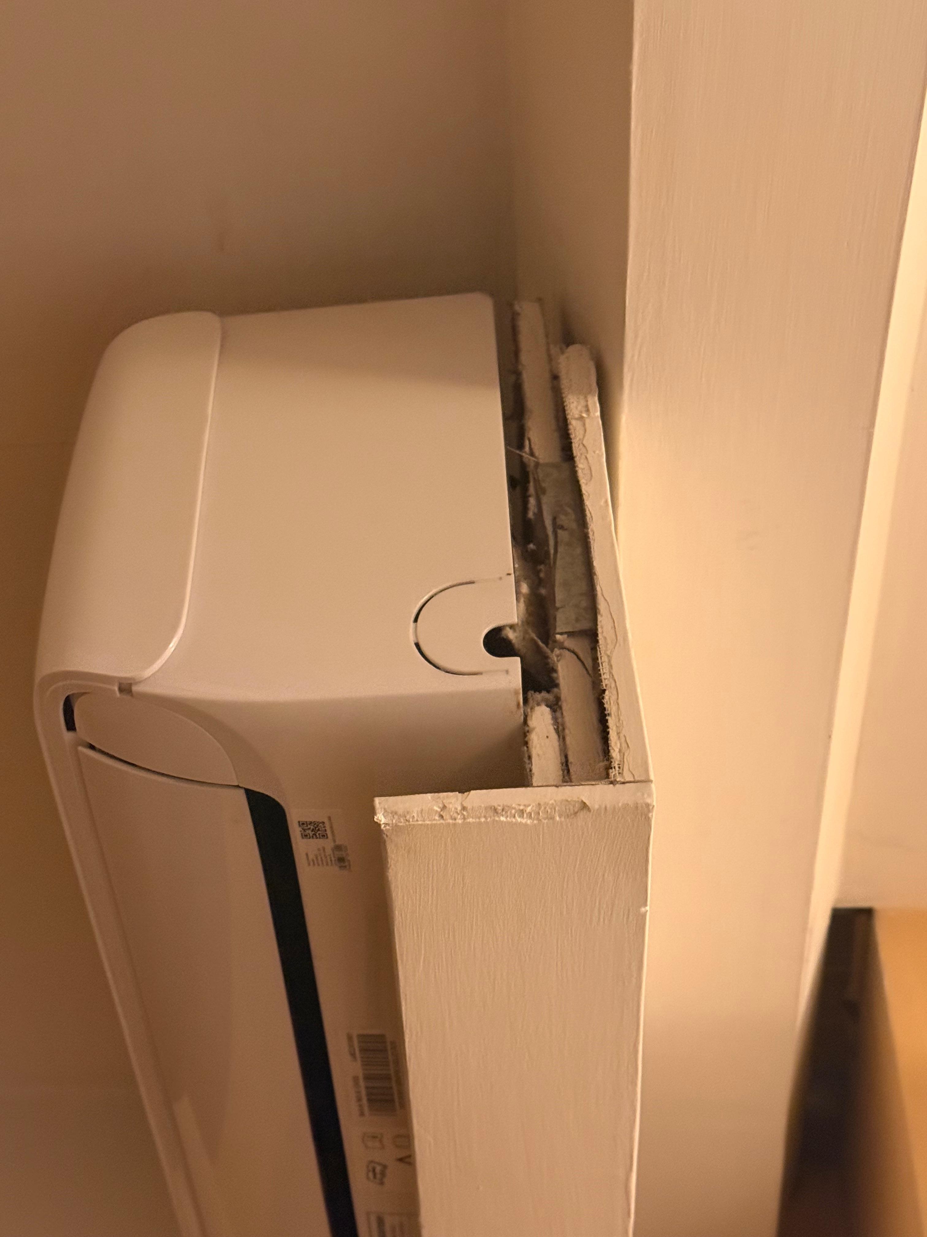Exposed/unfinished air conditioning installation - looks unsafe. 