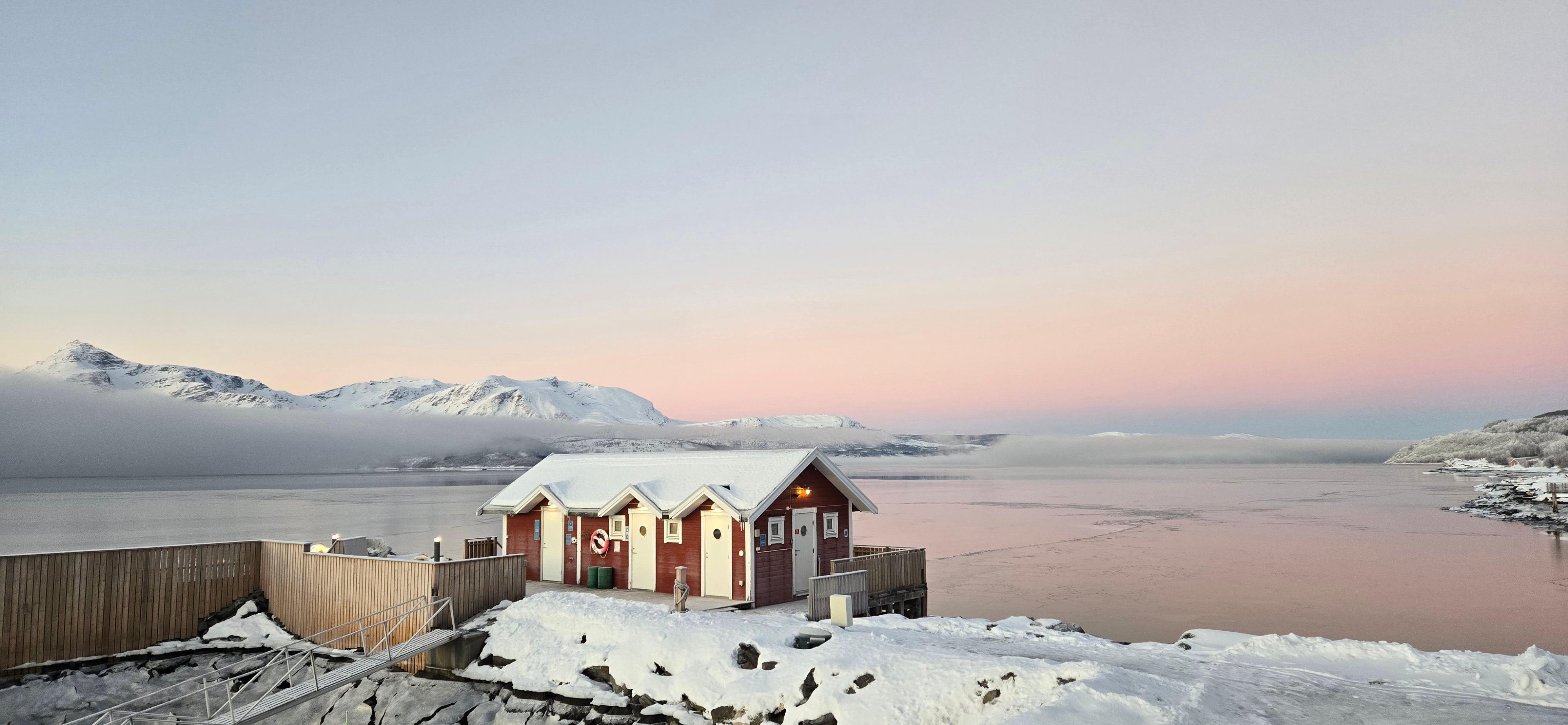 Sunrise fjord view back porch of resort