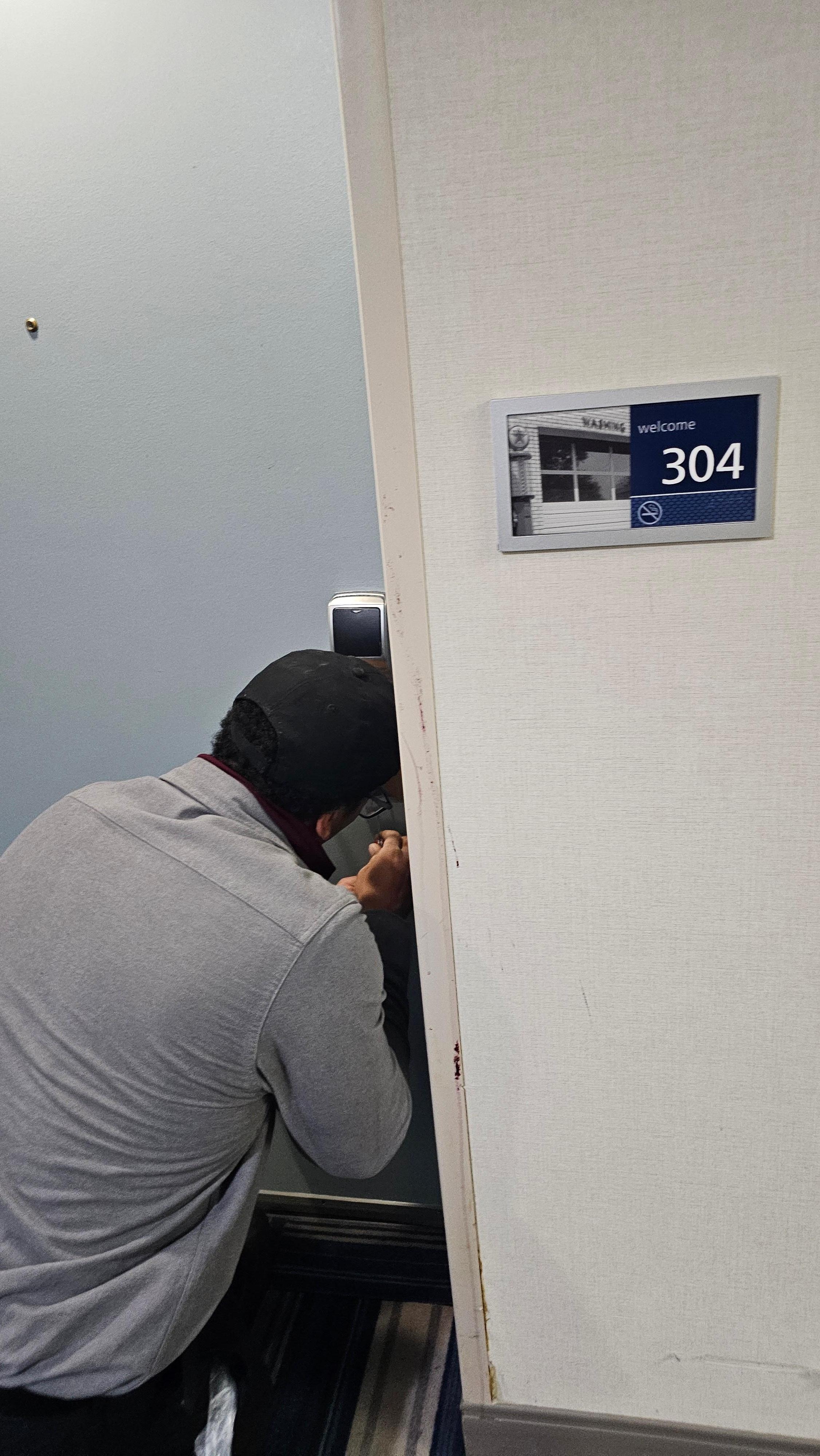 The person trying to get us in our room