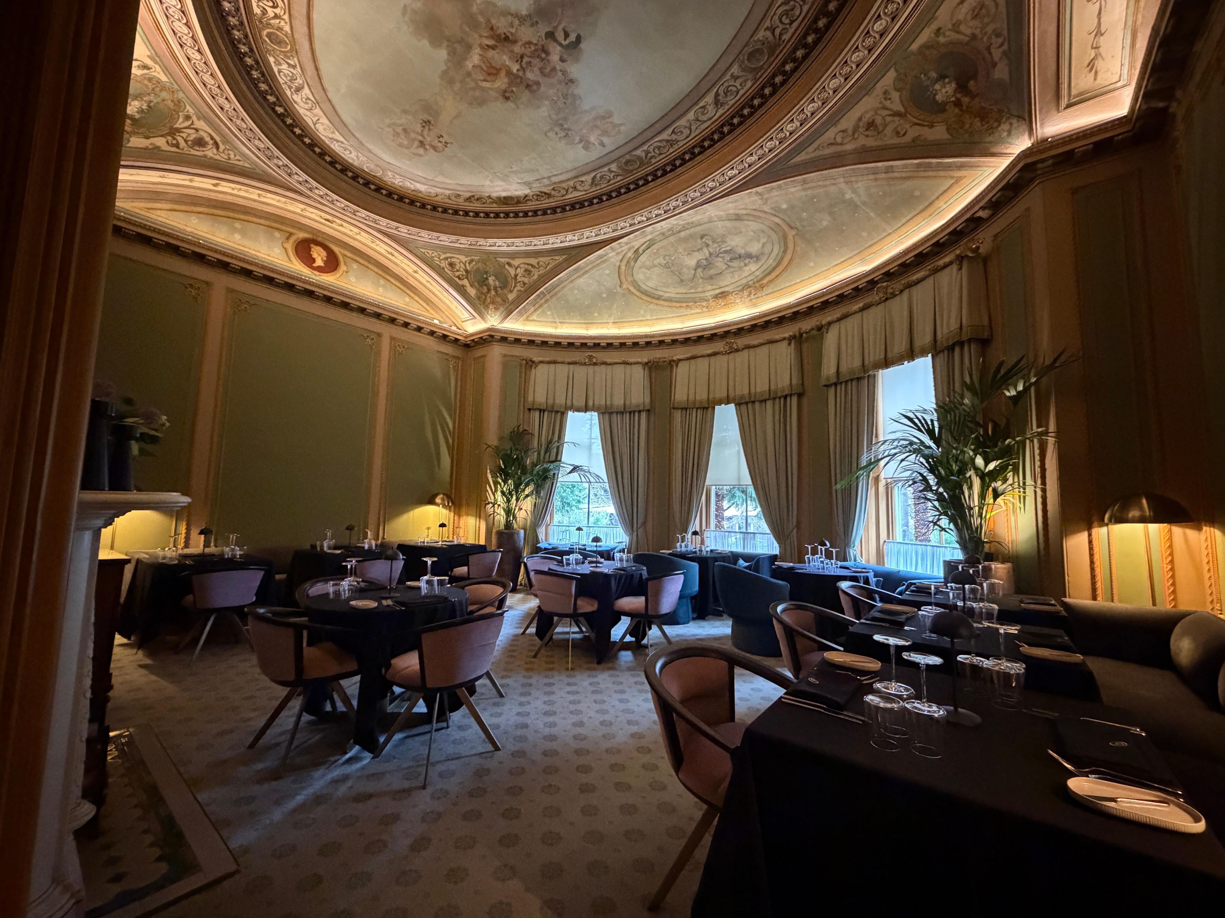 Dining room with 18th century painting on the ceiling 