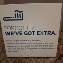 Picture of a sign asking if we forgot anything with an actual hair on it.