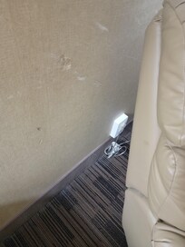 Wall had damage marks.