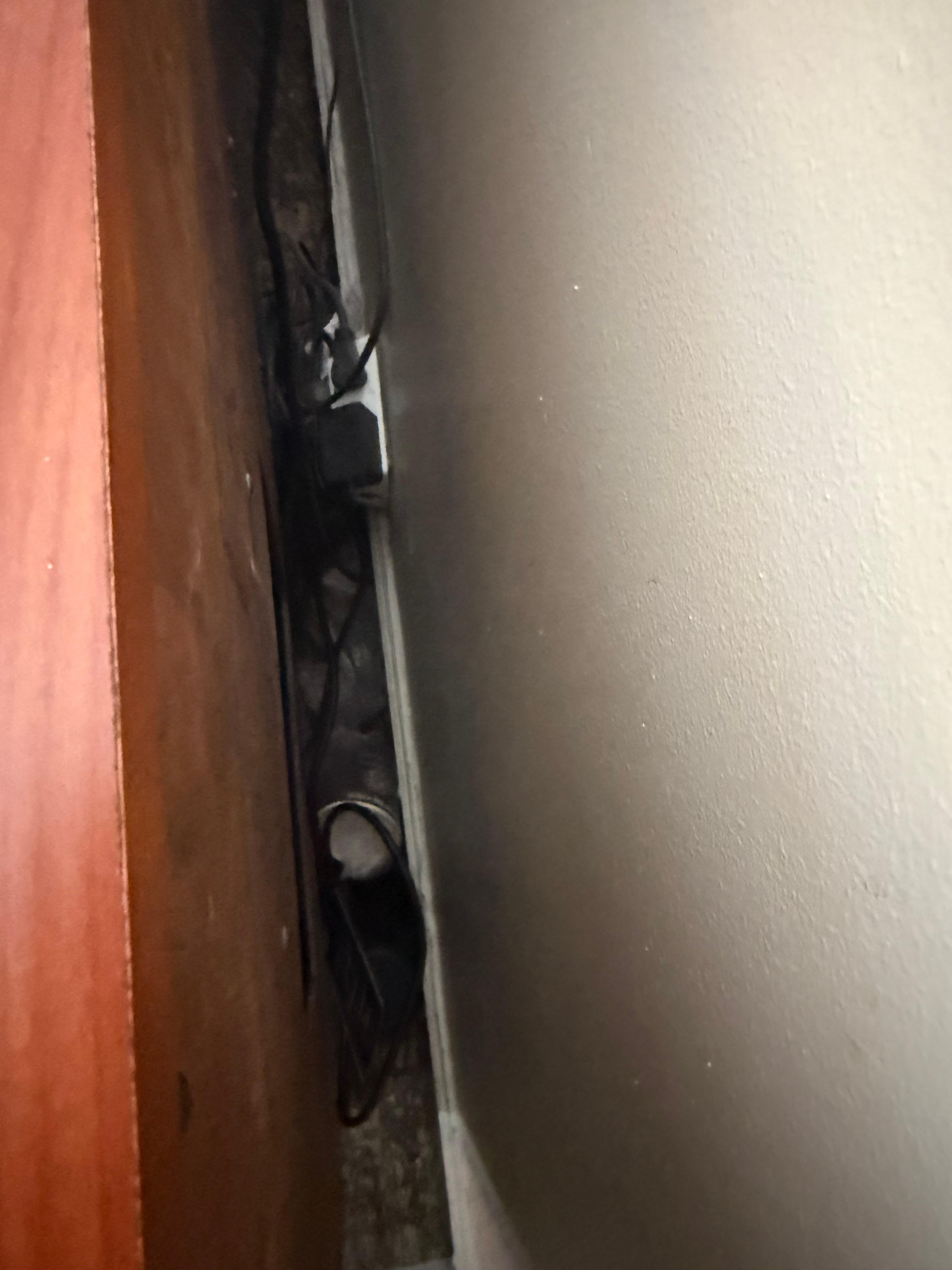 Trash behind dresser. We tried fixing the broken tv