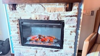 Fireplace in the living room! Nice place indeed