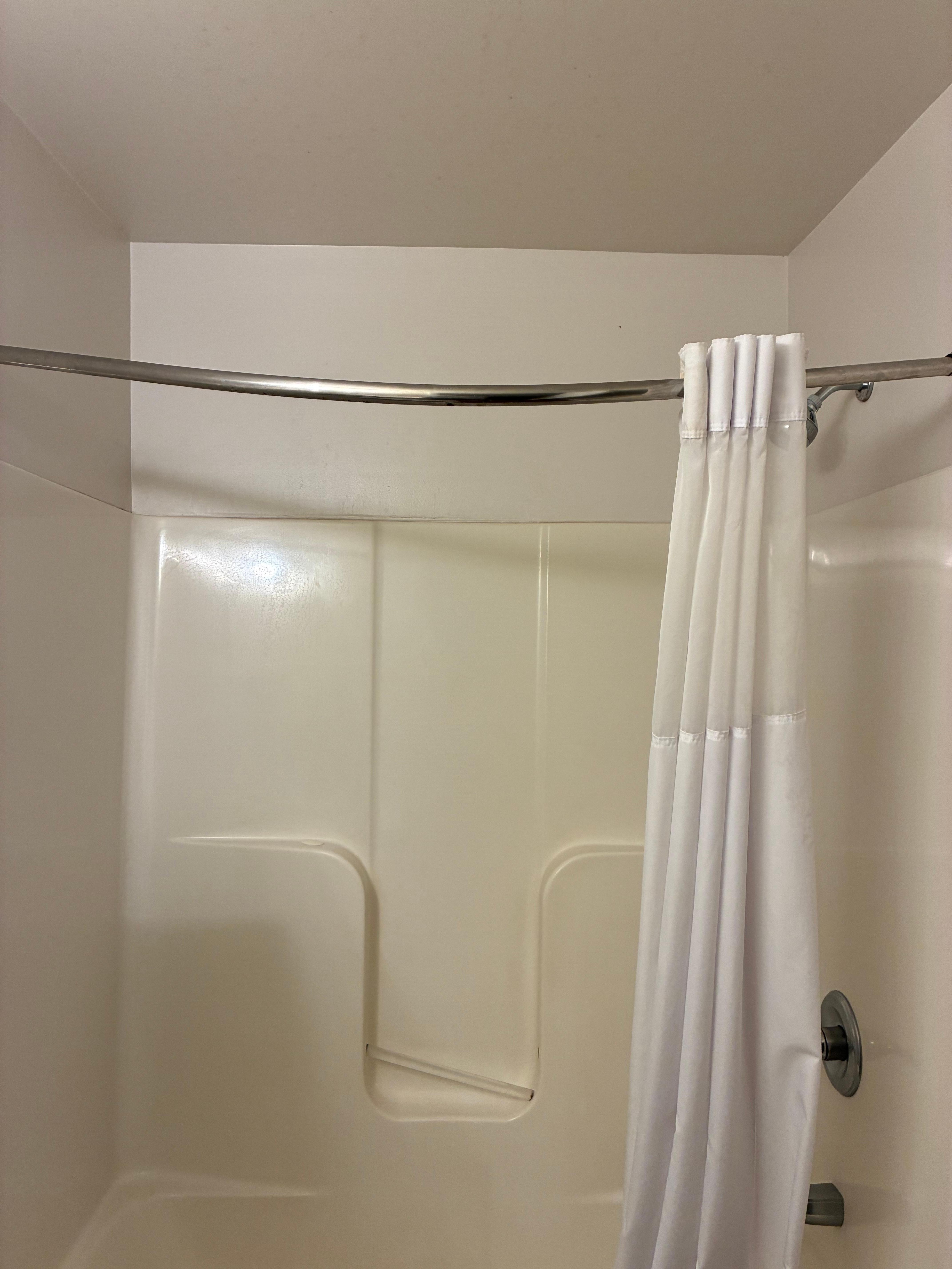 Shower rod coming down so curtain would not close end to end 