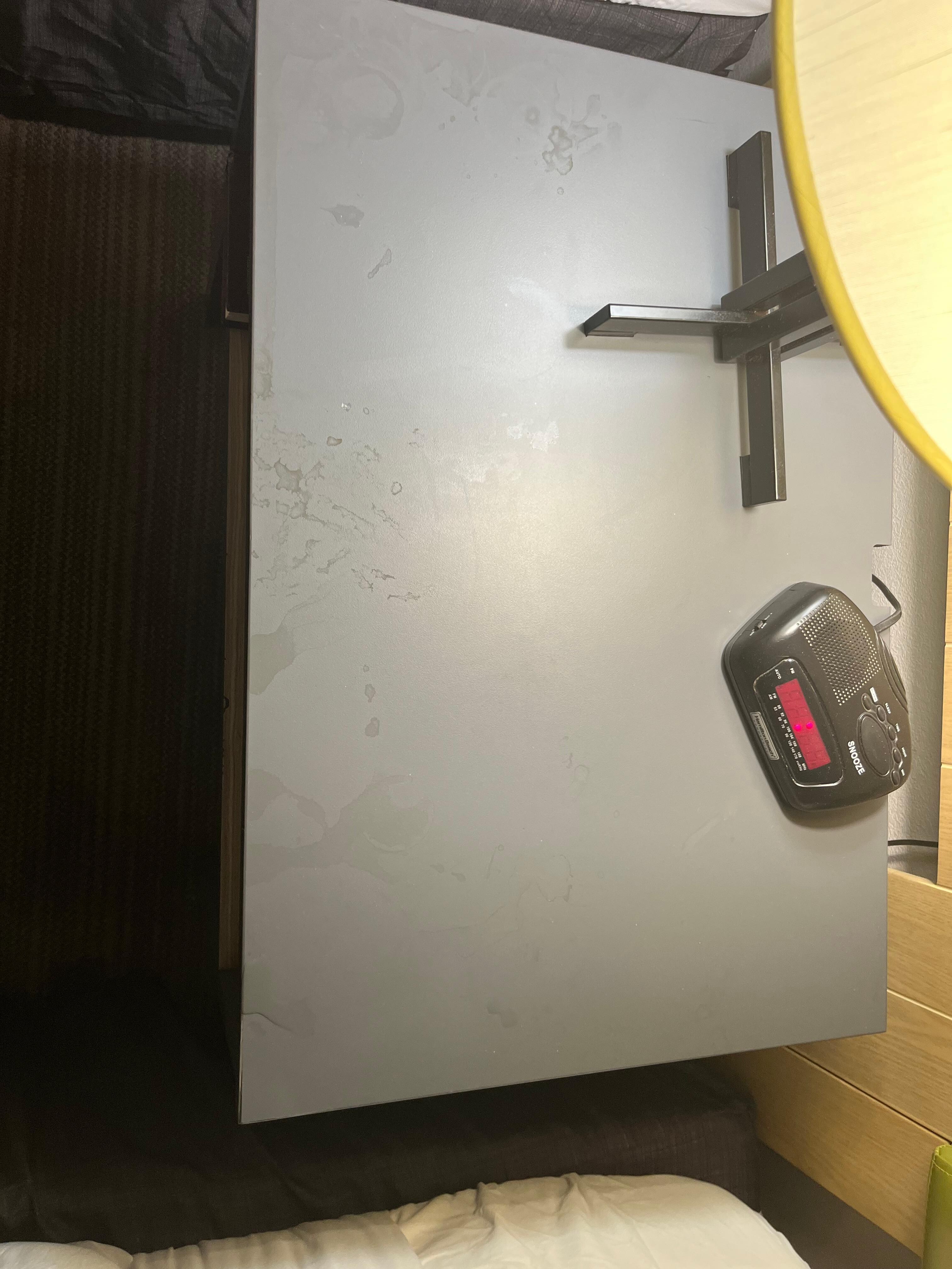 Sticky nite stand with food crumbs 