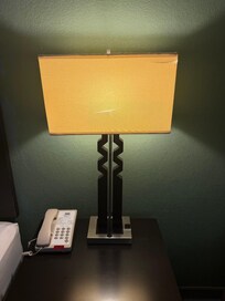 Cracked shad and a dirty nightstand