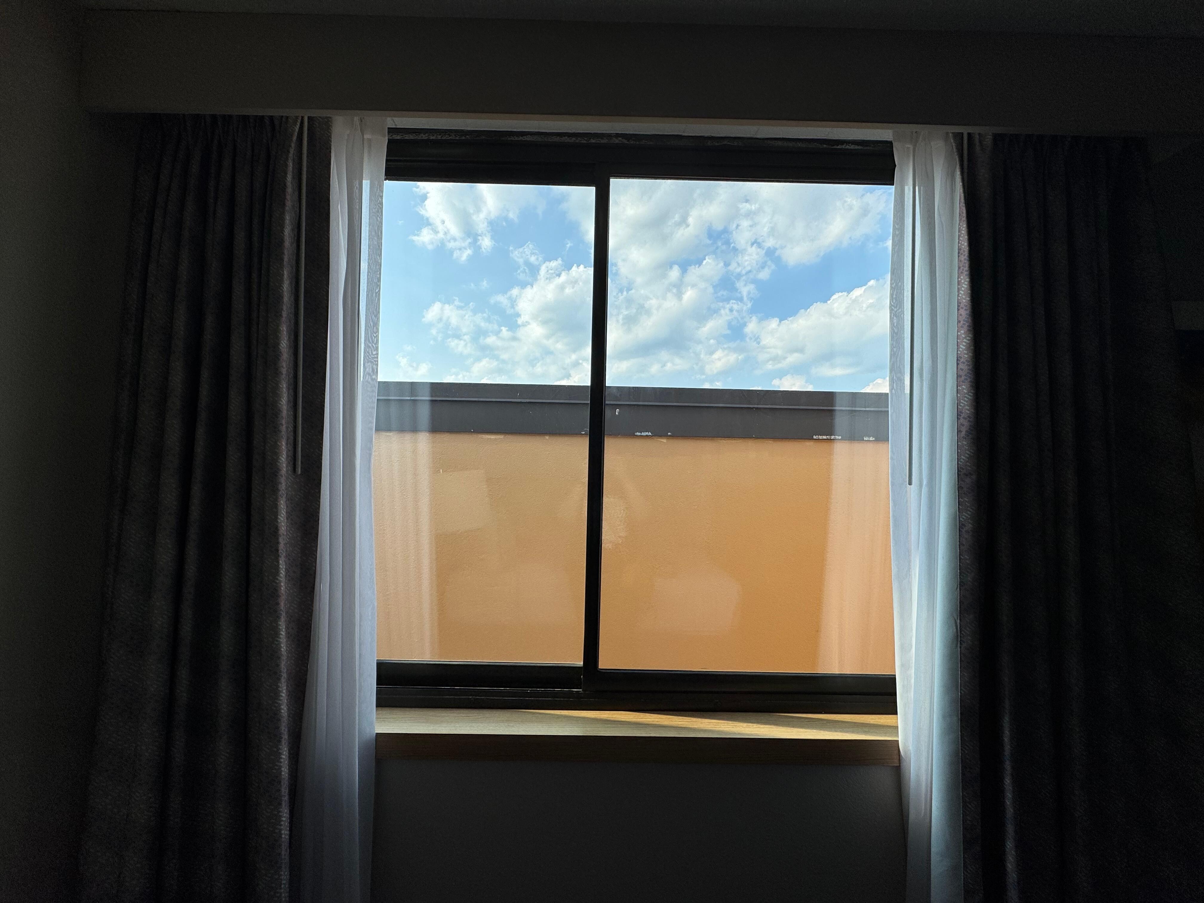 I was in room 314, this was our view during our stay. At least we had clouds to look at, with the occasional plane that flew by during takeoff or landing.