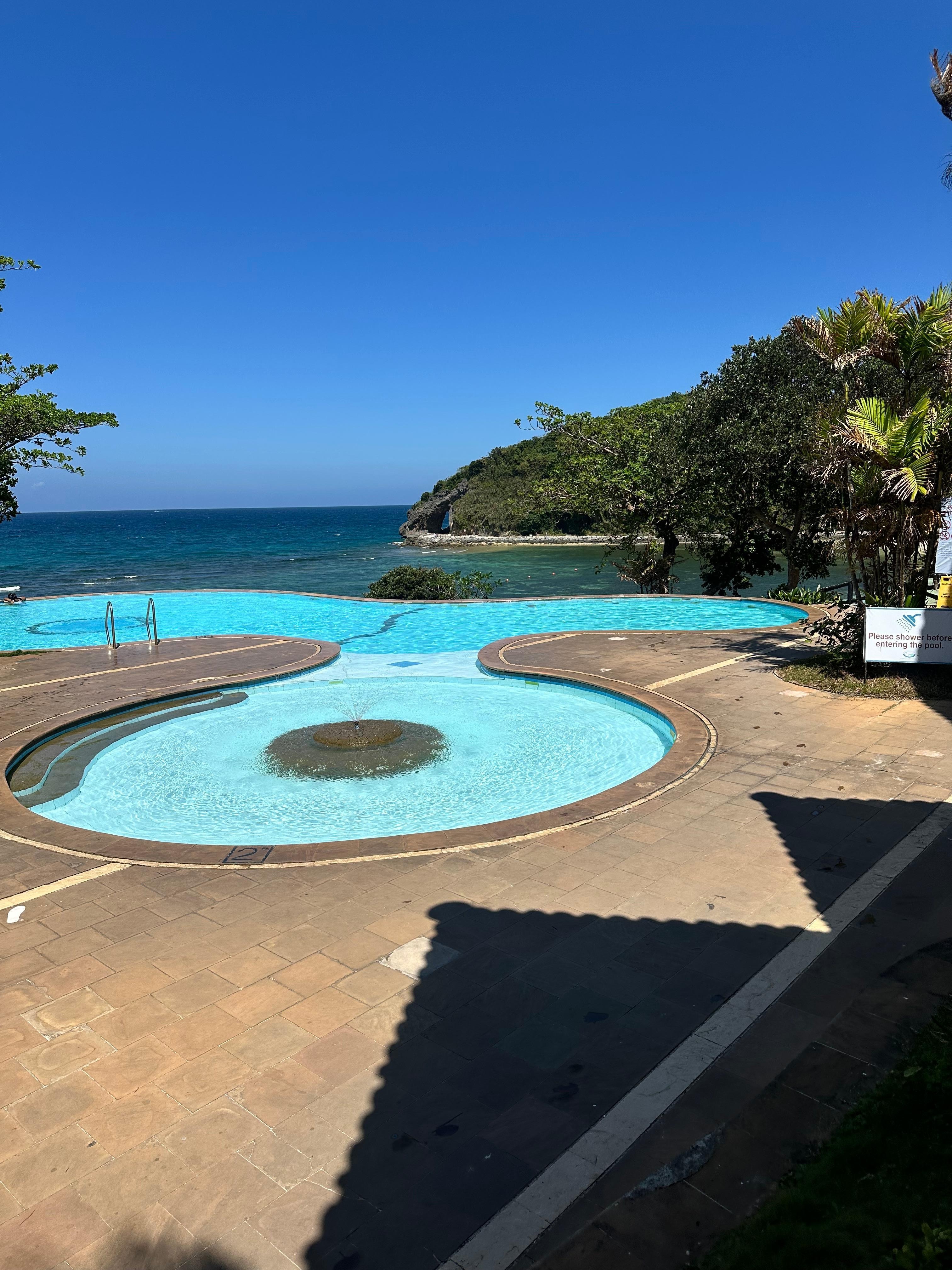 Pool leading to private beach. 