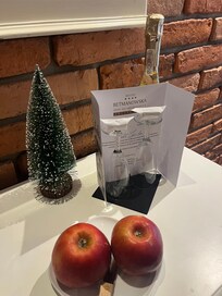 Welcome bottle of sparkling supine and fresh fruit.