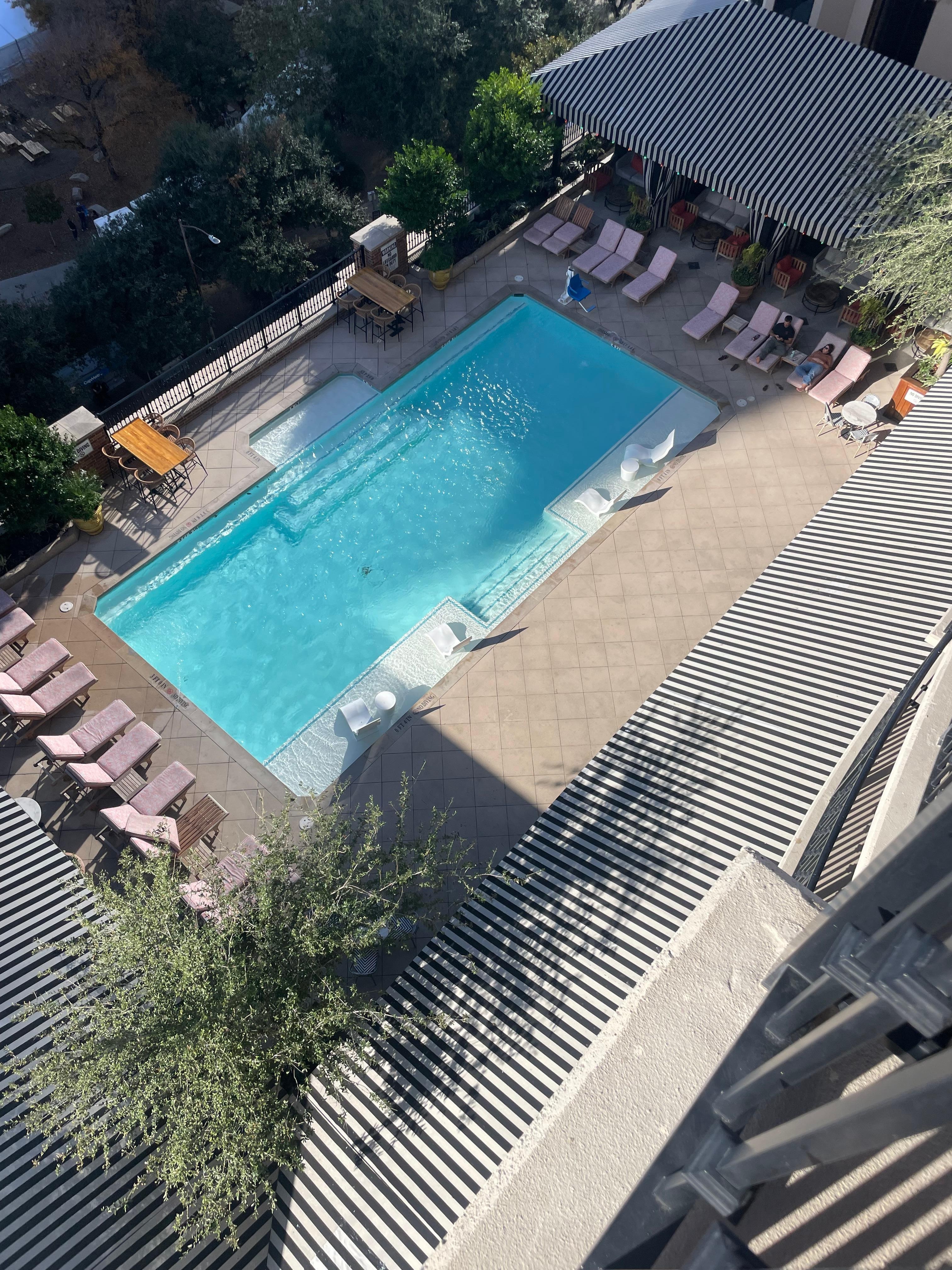 View of pool from hotel room balcony 