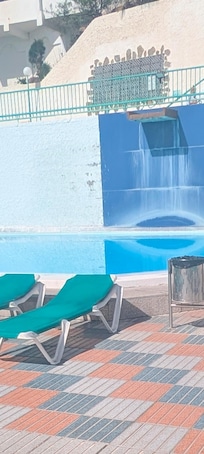 Area around the pool needs a clean and paint up.