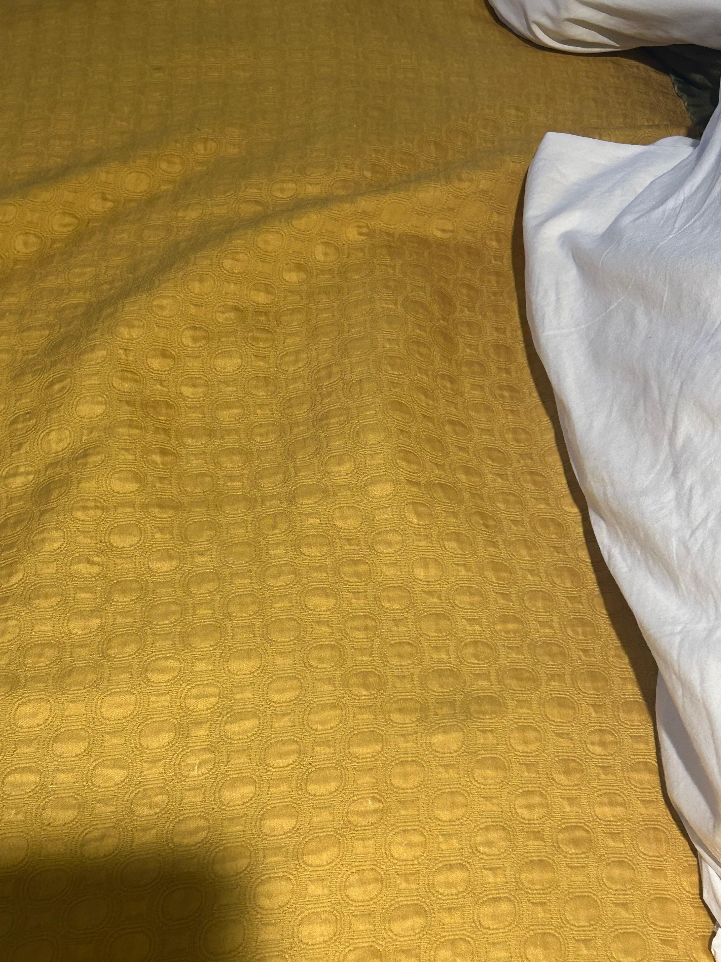 Below the pillow there is a bigger stain