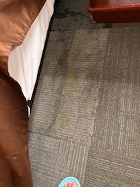 Carpet in front of nightstand- close up