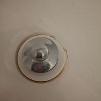 The tub after I cleaned it, with sanitizer wipes, tub was cobbled together with pain and tape.