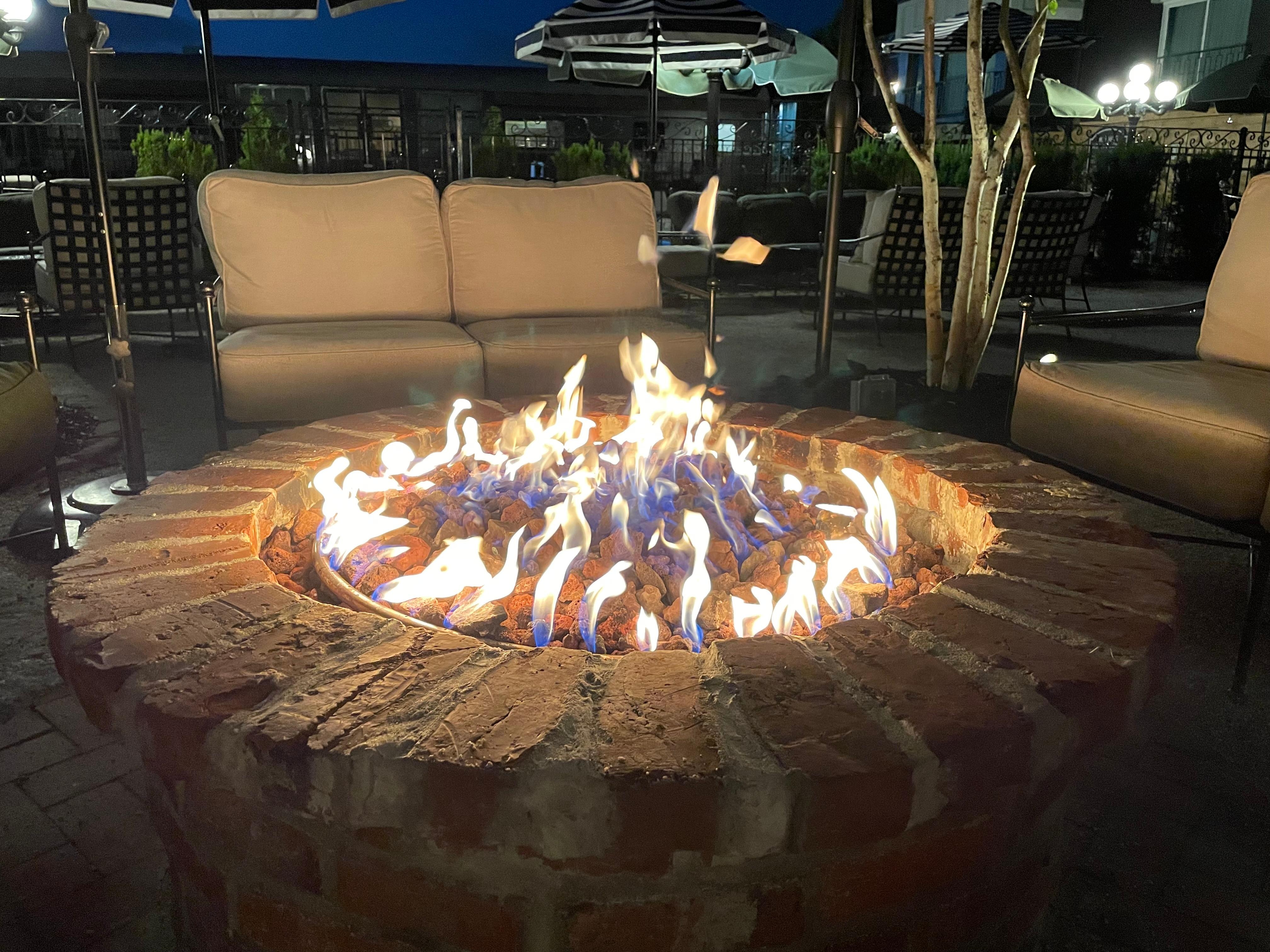 Pool side fire pit