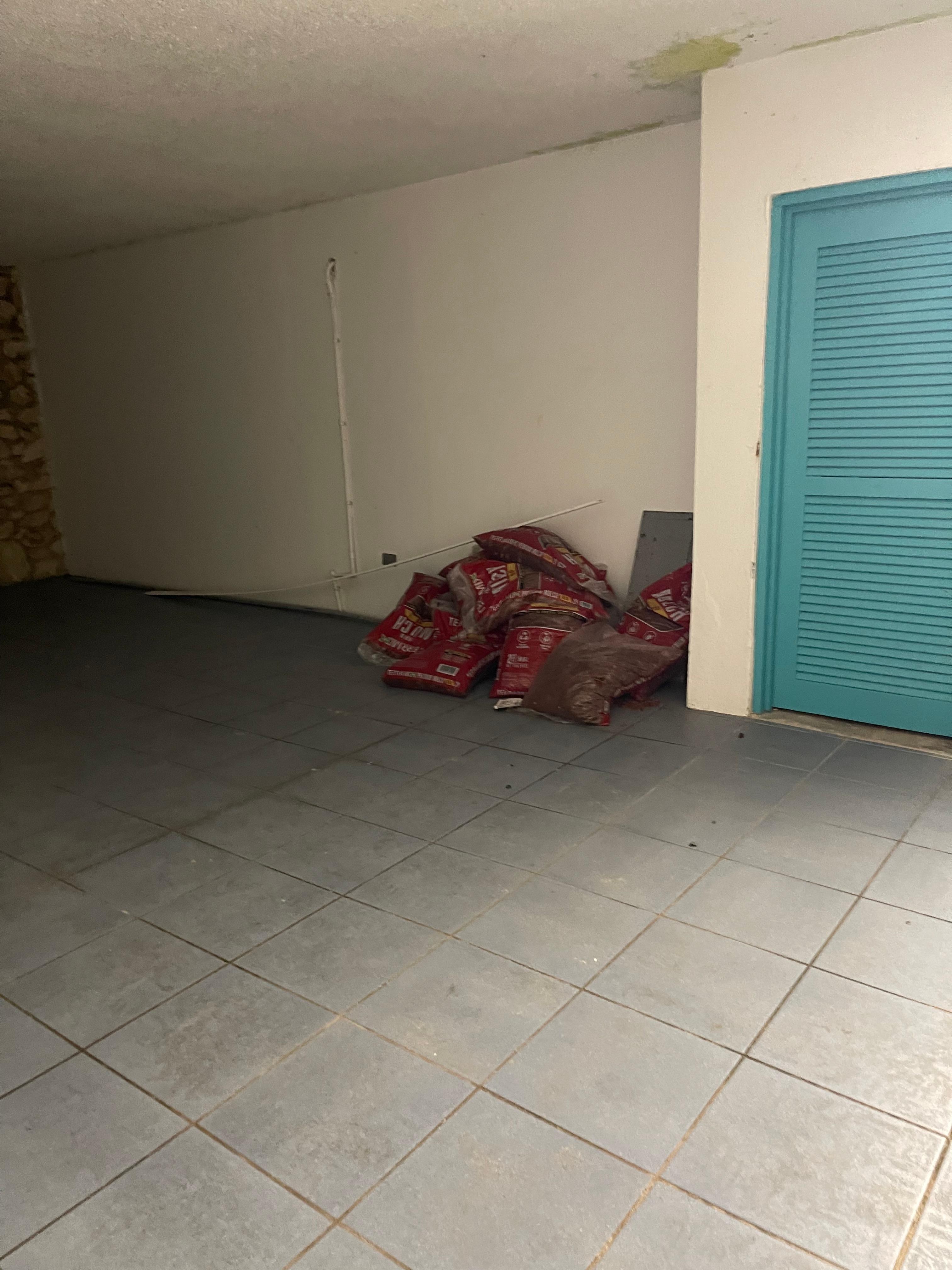 The hall outside the room.