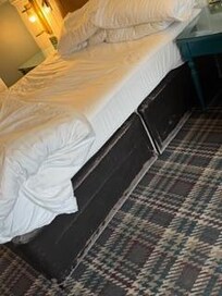 Bed base flaking and peeling which will make it difficult to clean and will harbour germs.