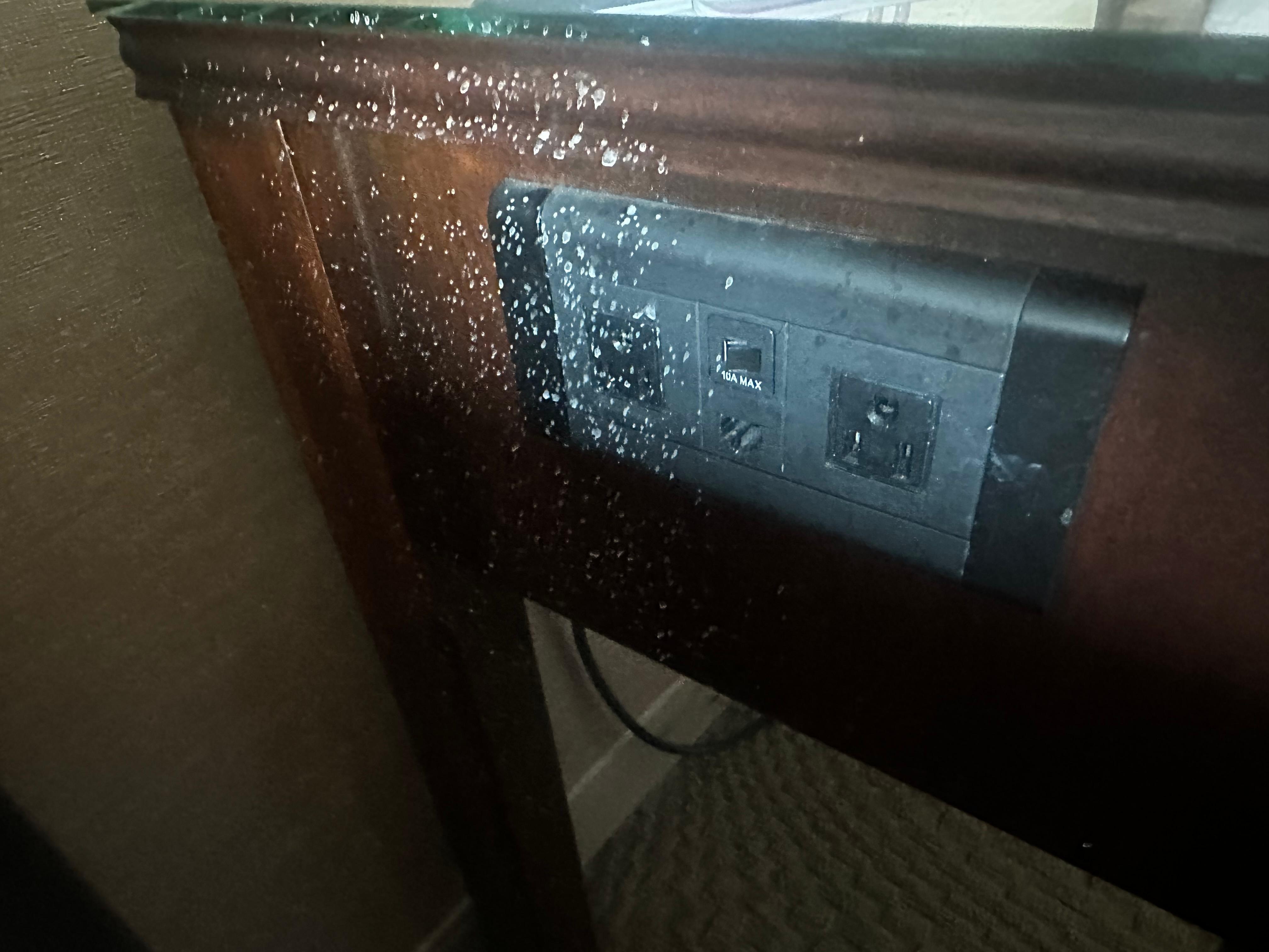 Some nasty residue next to the bed