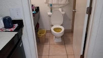 Toilet in first room overflowing, when asked for a plunger, front desk said we don't have one.