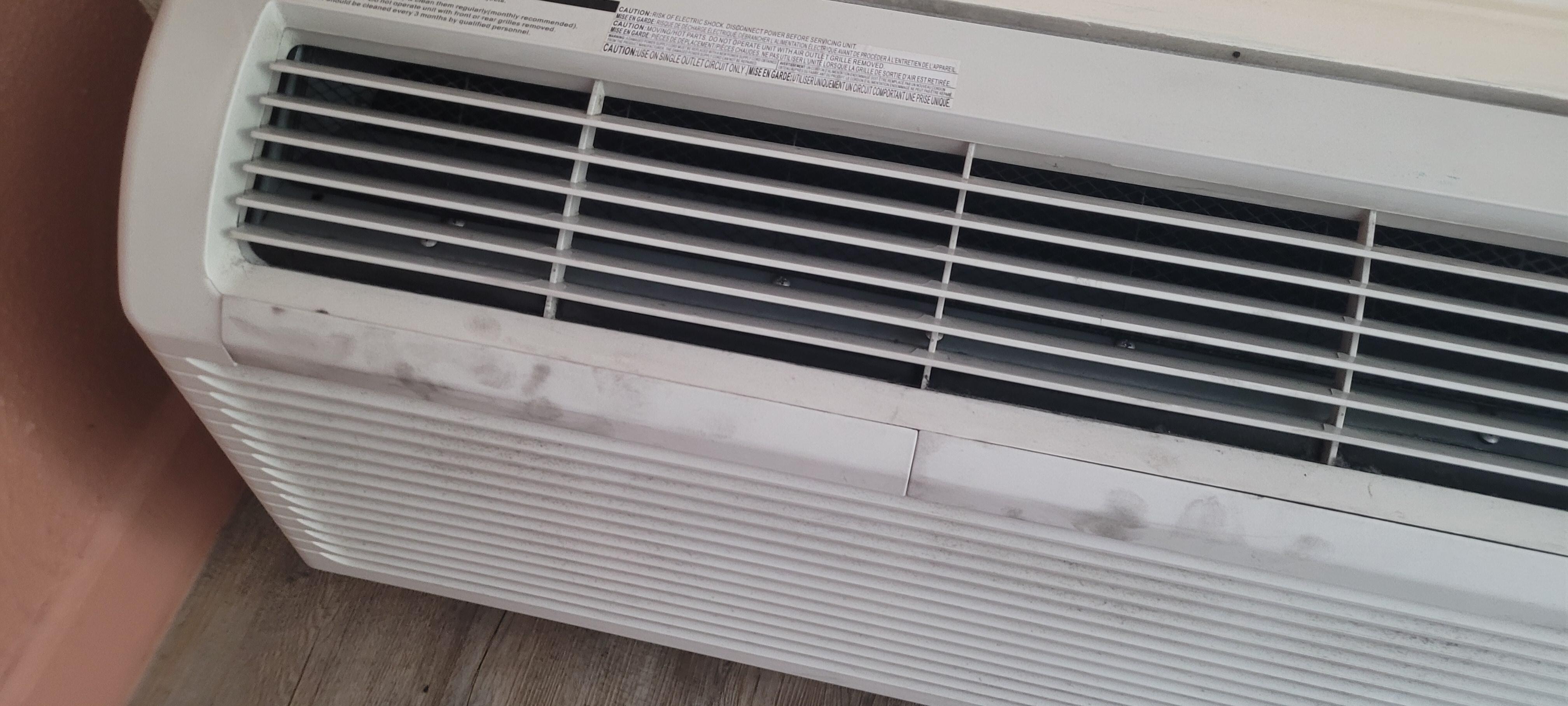 Nasty black hand prints on the ac