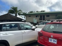 Next to sushi restaurant and above spa, dogs next door