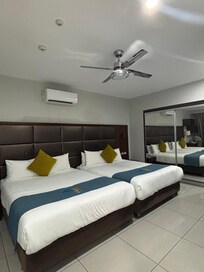 Spacious room with big beds and comfortable pillows