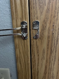 Cheap, broken bar lock.