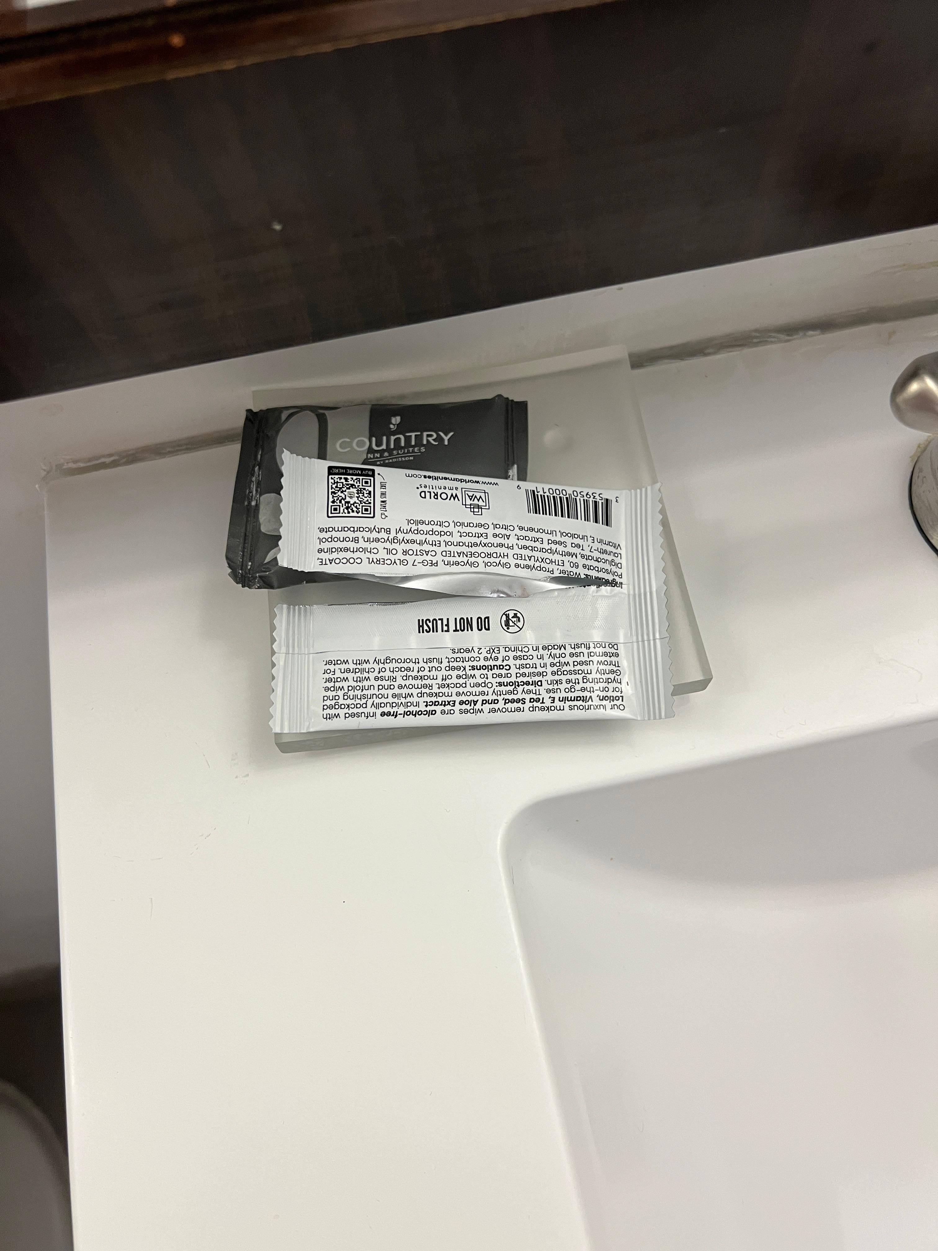 Open makeup remover package. 