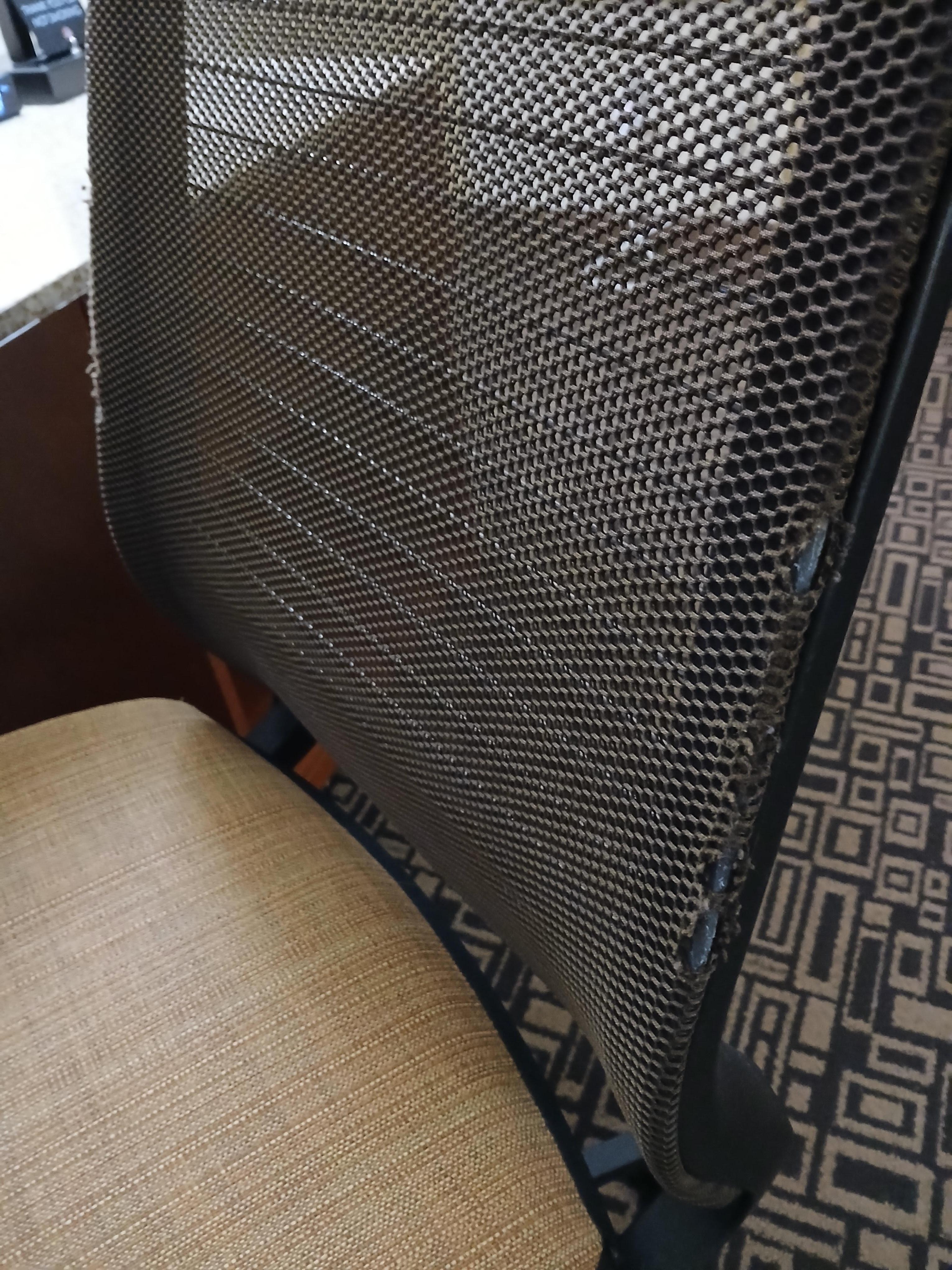 Desk chair with holes.