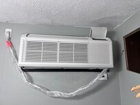 Heating/cooling unit near ceiling